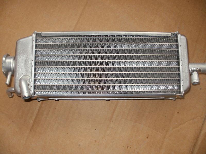 Buy RM125 1996 RADIATOR, RH SUZUKI NEW OEM in gr, GR, for US $99.00