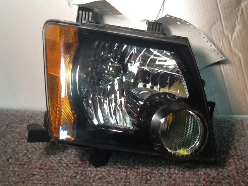 Buy Nissan Xterra Headlight OEM 09 10 11 12 black bezel in Bloomfield ...