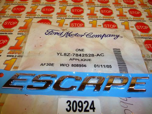 Buy FORD ESCAPE NAME PLATE EMBLEM YL8Z-7842528-AC OEM in Houston, Texas ...