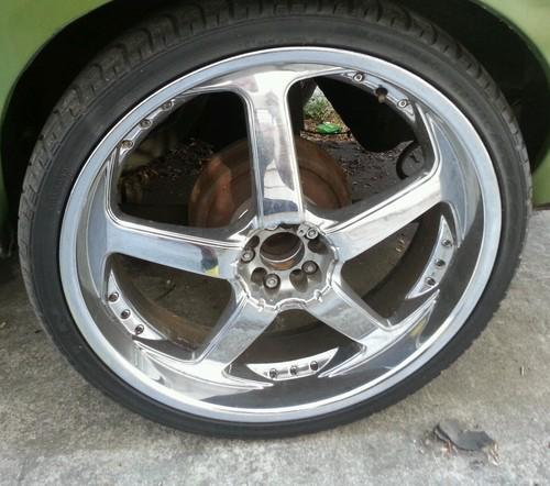 Sell Set of 4 5-lug Universal 24 inch defy rims with 255-30-24 tires in ...